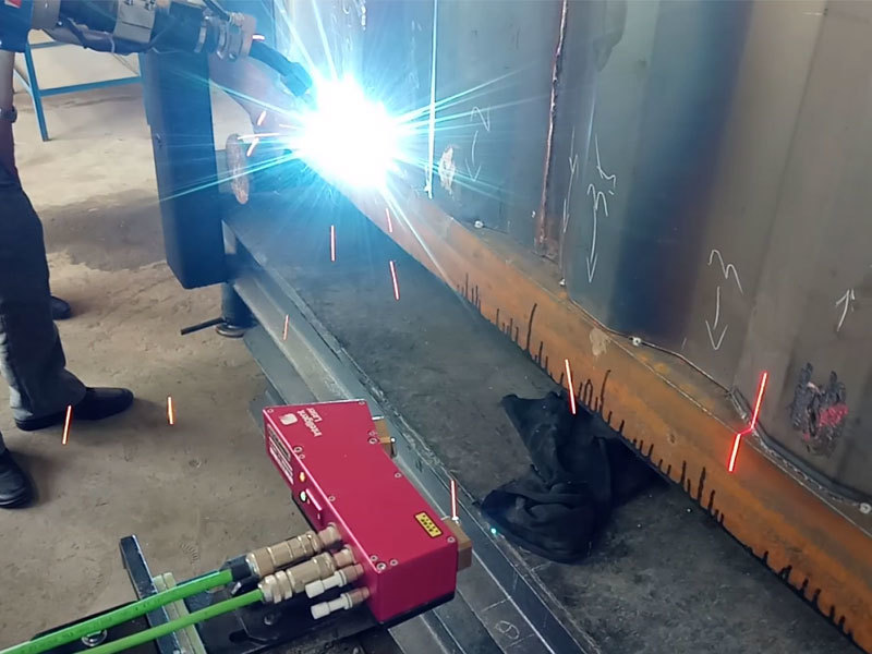 Seam Tracking System in Corrugated Plate Welding: Intelligentlaser